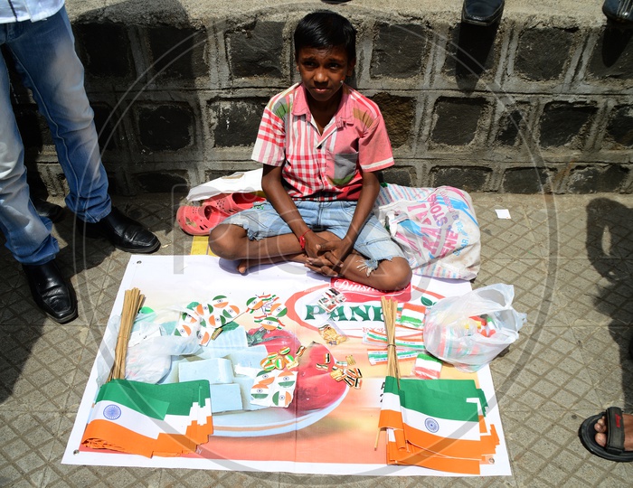 Image of A Boy Vendor Selling Indian National Flags On Independence Day ...