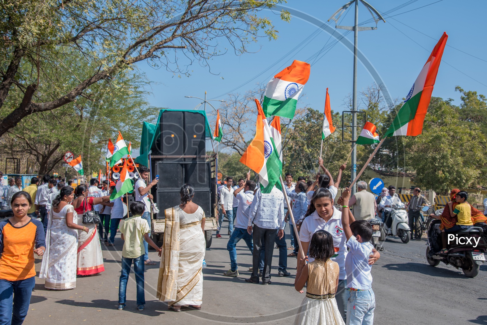 Image of Indian Youth Waving The Indian National Tri Color Flag in a ...
