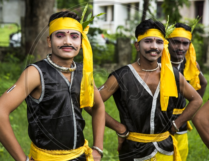 Image of Tribal Man Wearing Tribal Dress And Performing The Folk Dance ...