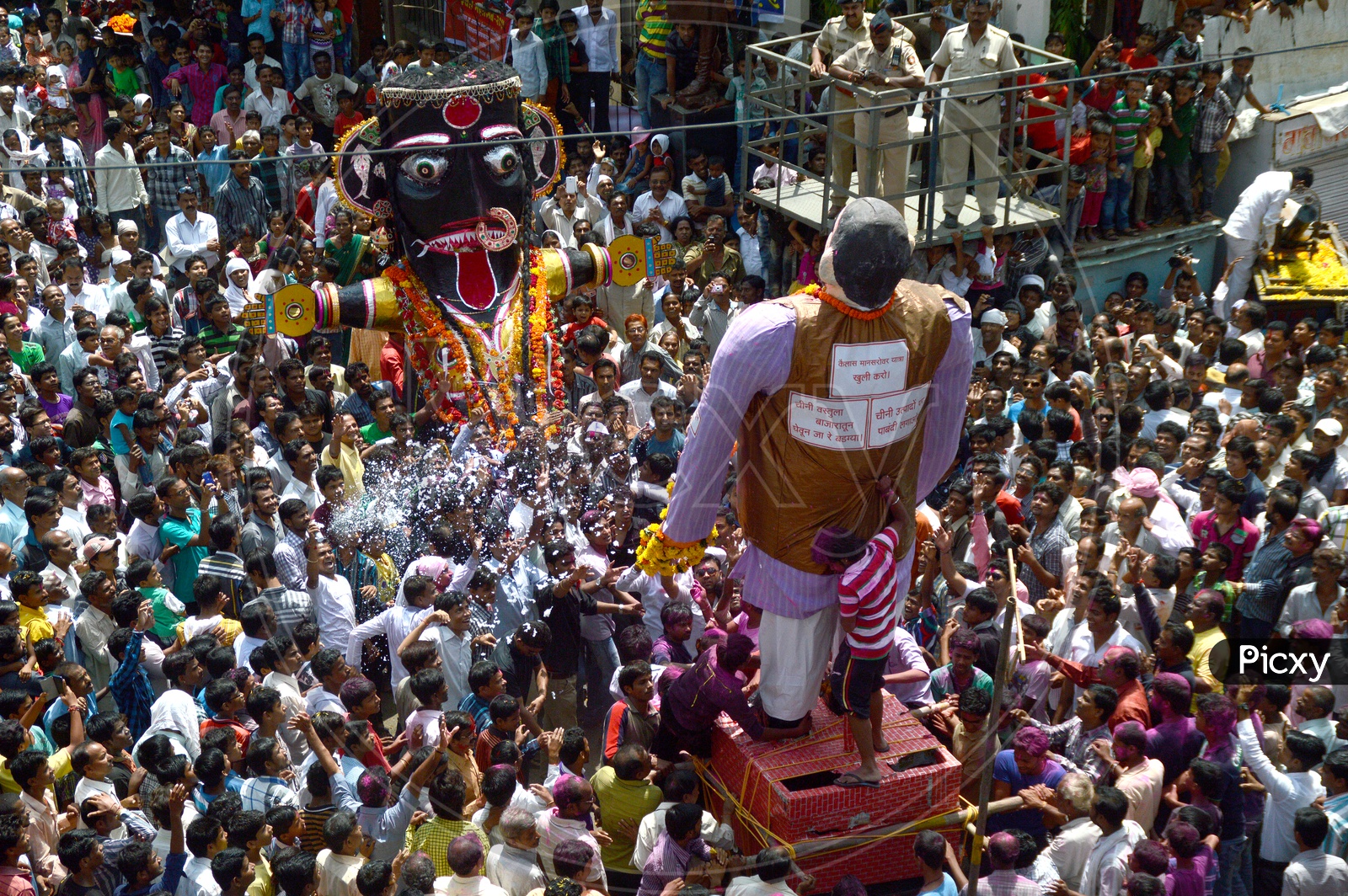 Image of Procession Of Marbat Festival With Dolls On the Streets Of ...