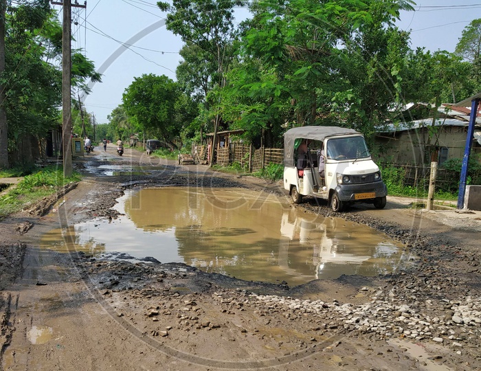 Image of Potholes Filled With Rain Water on Rural Village Roads in ...