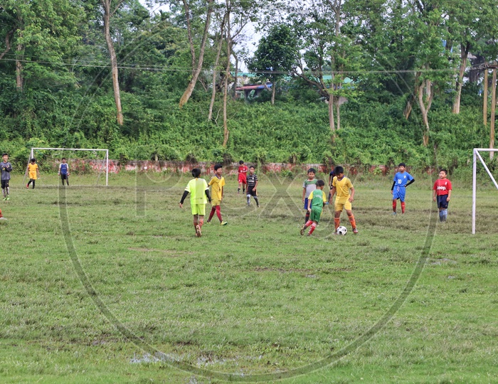 Image of Children Playing Football In a School Or College Ground ...