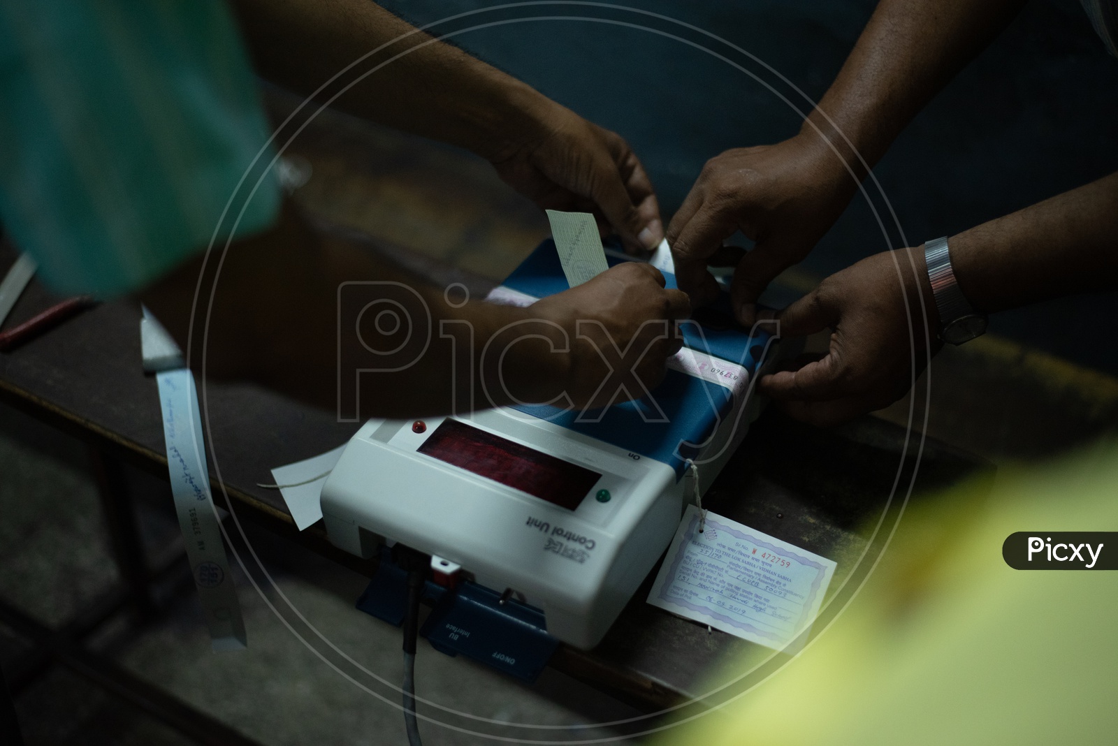 Image of Election Commission Polling Booth Officer Sealing The EVM ...