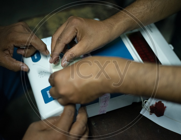 Image of Election Commission Polling Booth Officer Sealing The EVM ...