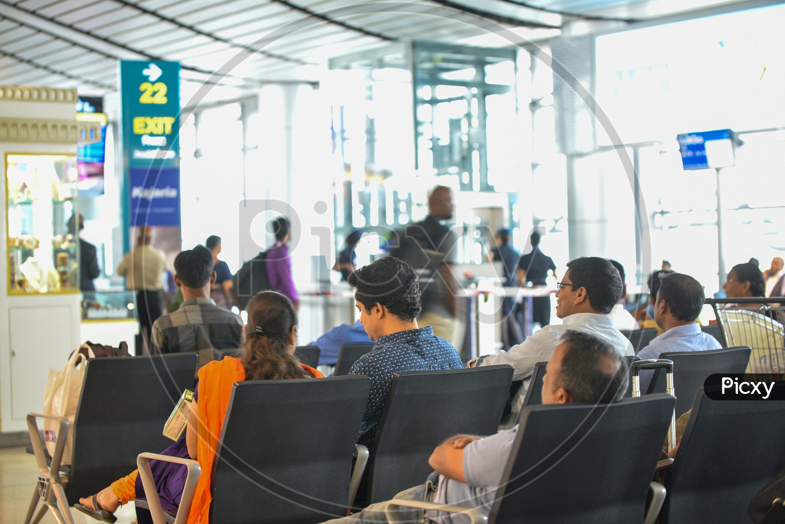 Image of Airport scenes With Passengers Waiting In Waiting Lounge And ...