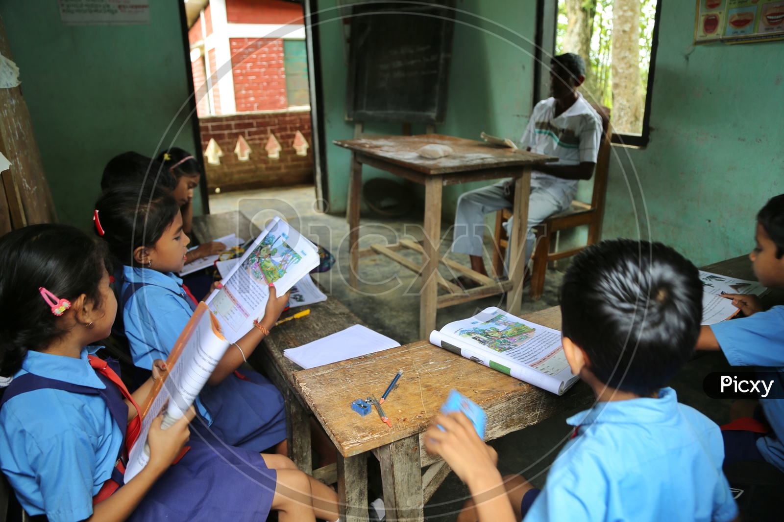 Image of Classrooms With Child Students and Teacher in Rural Village ...