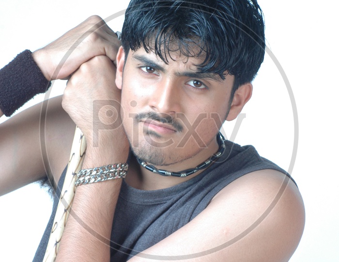 Image of An Indian Man In Traditional Rural Man Attire Holding Wooden ...