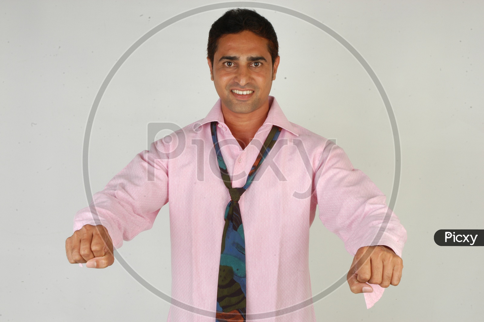 Image of Indian Man in A Leisure Look With Loosen Tie And Fetching Hand ...