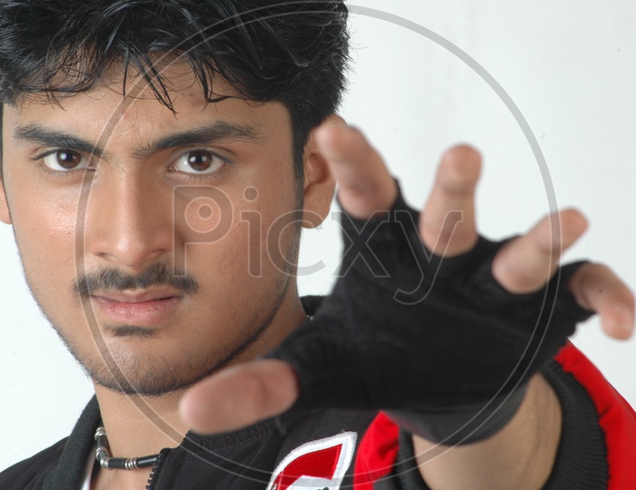 Image of Portrait Of a Angry Indian Young Man With His Fist Tripping ...