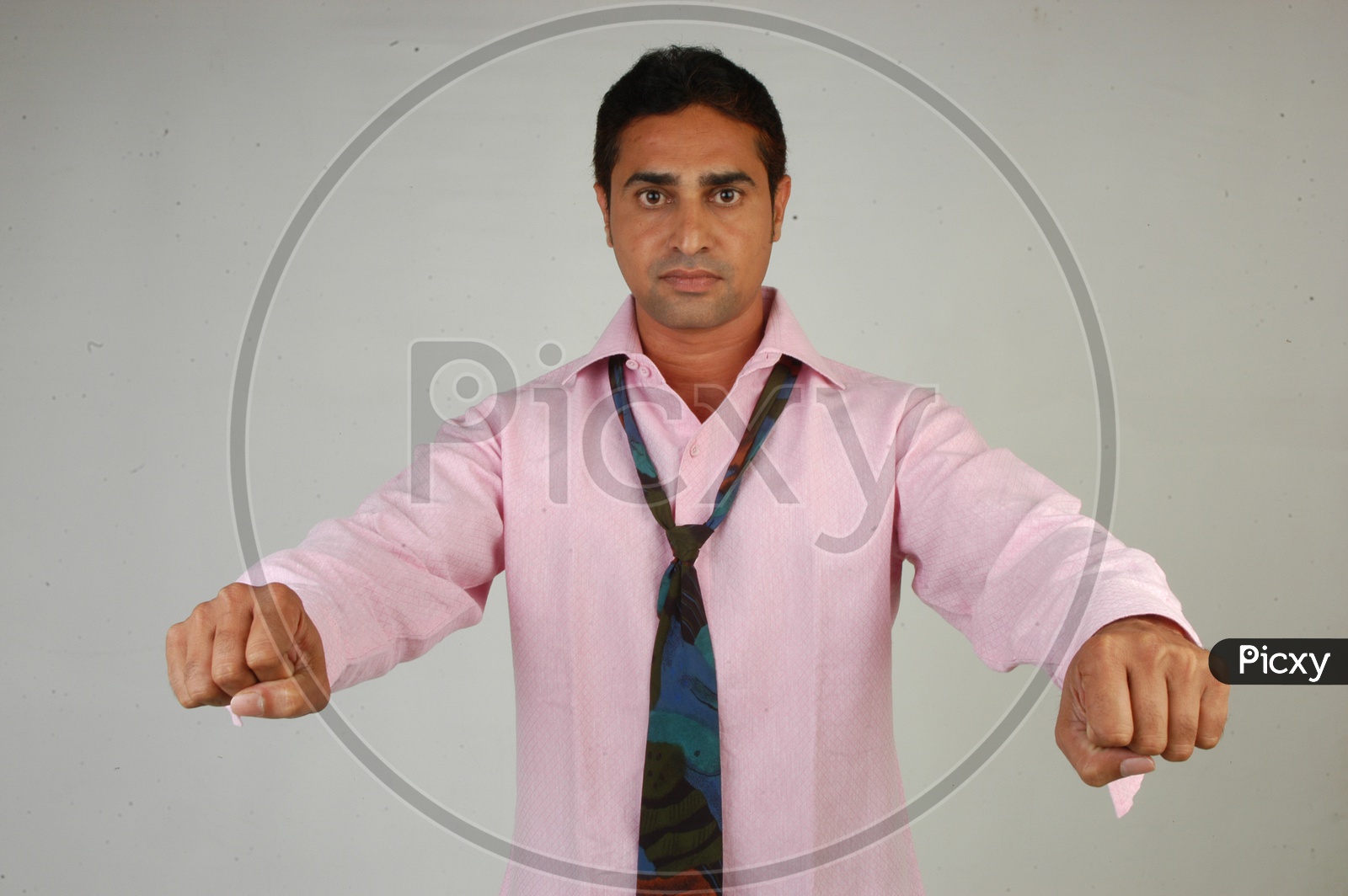 Image of Indian Man in A Leisure Look With Loosen Tie And Fetching Hand ...