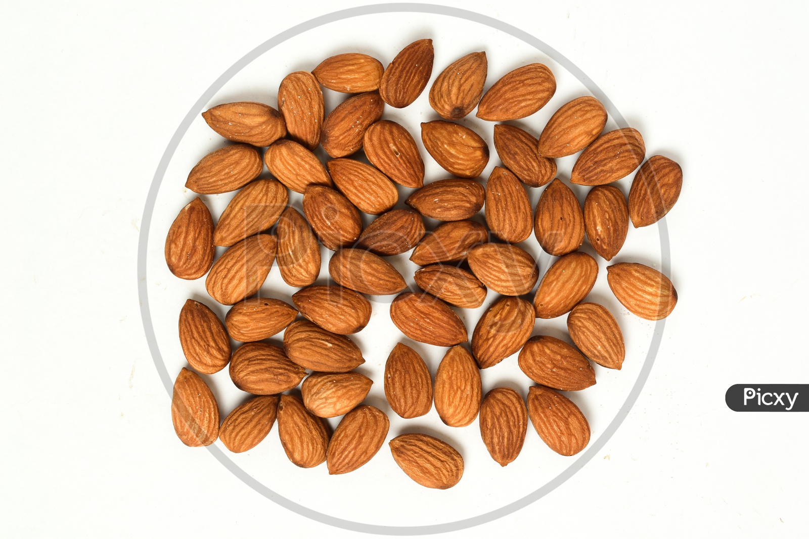 Image of Almonds/ Badam pappu on a white background.-OB431470-Picxy
