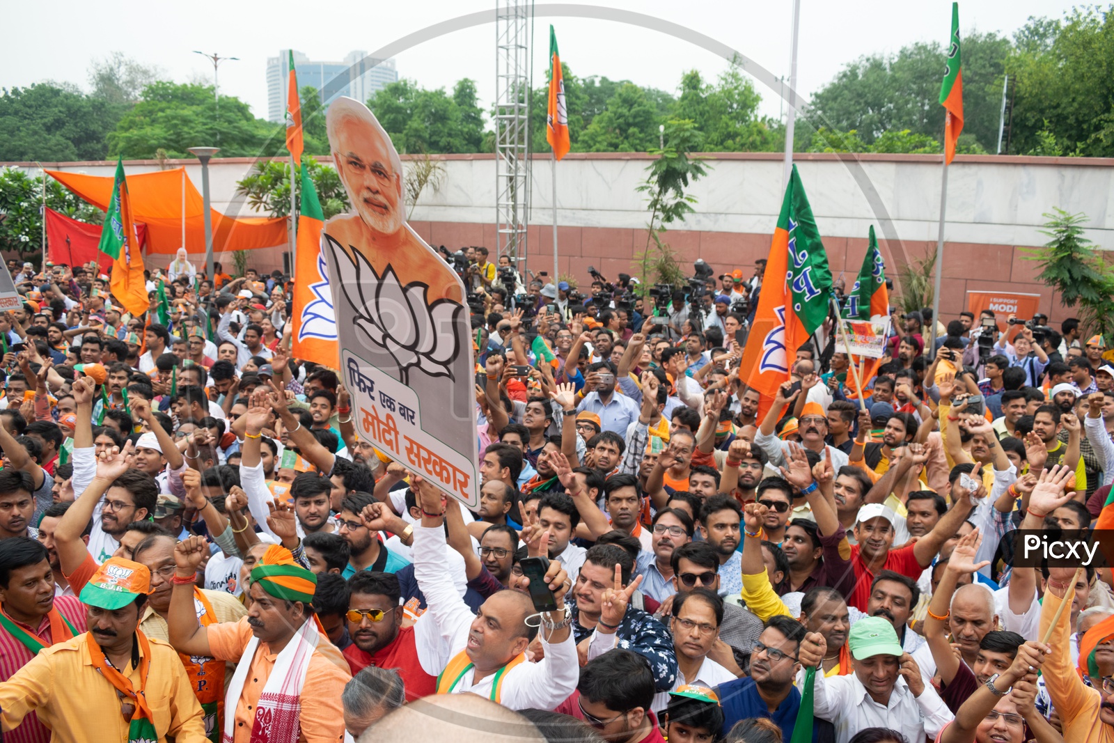 Image of Supporters of Bhartiya Janta Party (BJP) celebrating BJP victory in Lok Sabha election ...