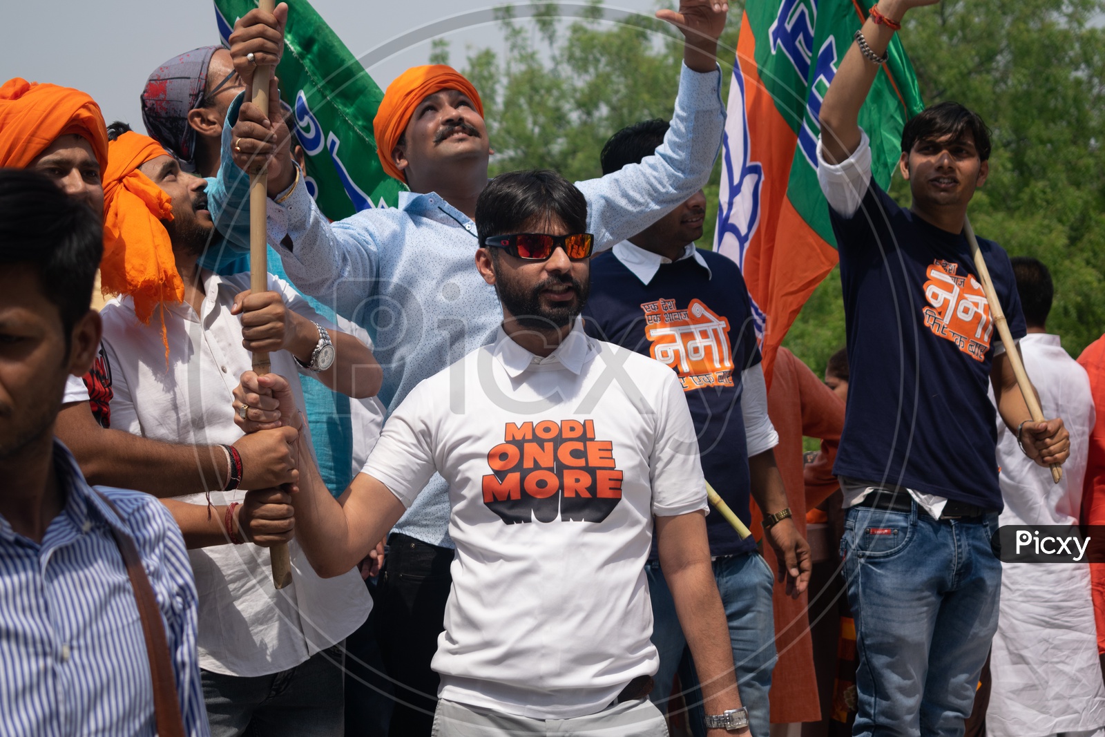 Image of Men wearing t-shirts to support Bhartiya Janta Party (BJP)-NW085247-Picxy