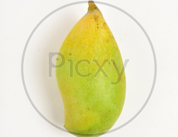 Image of Totapuri or Collector mangoes in a basket.-GR668751-Picxy