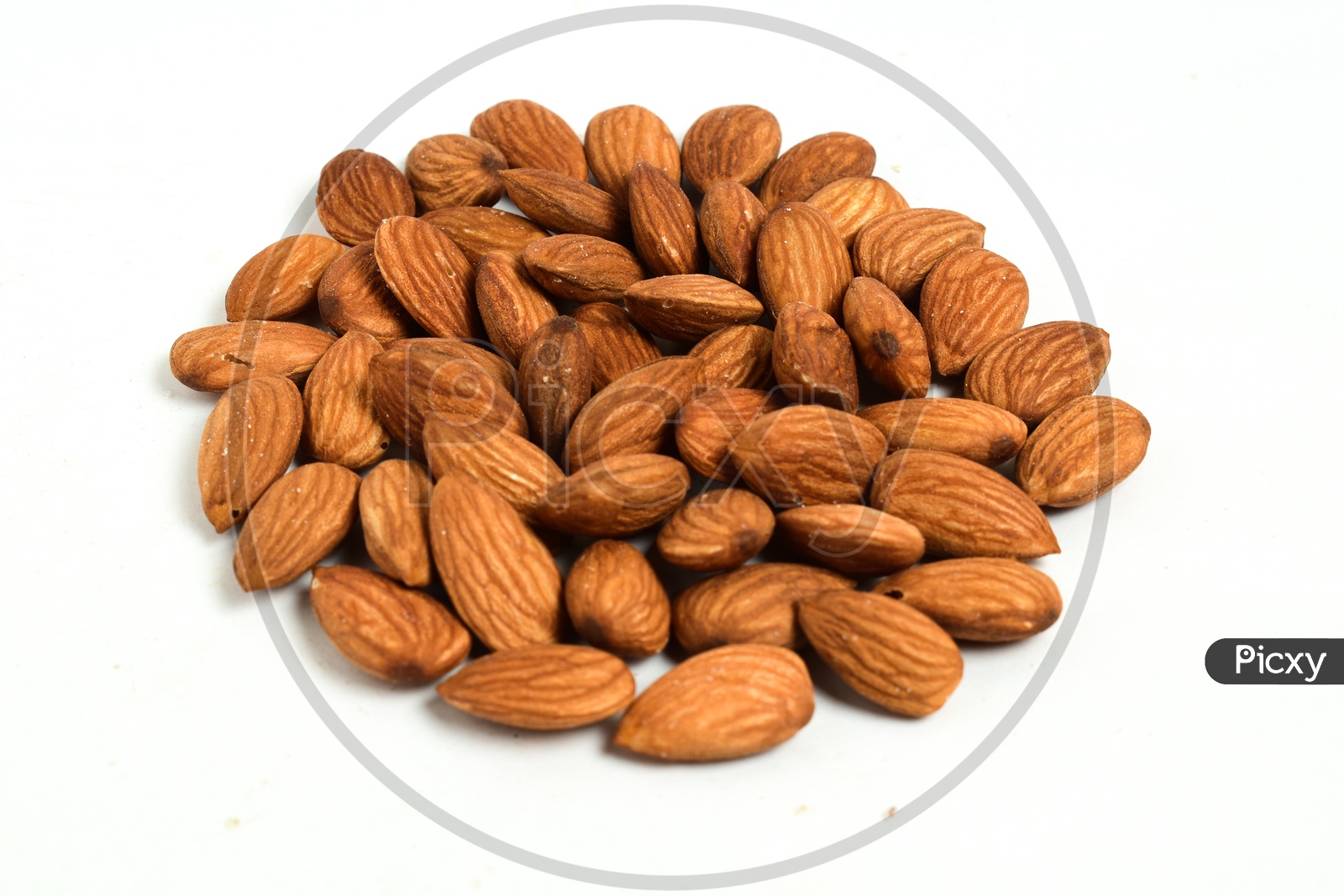 Image of Almonds/ Badam pappu on a white background.-LF153277-Picxy