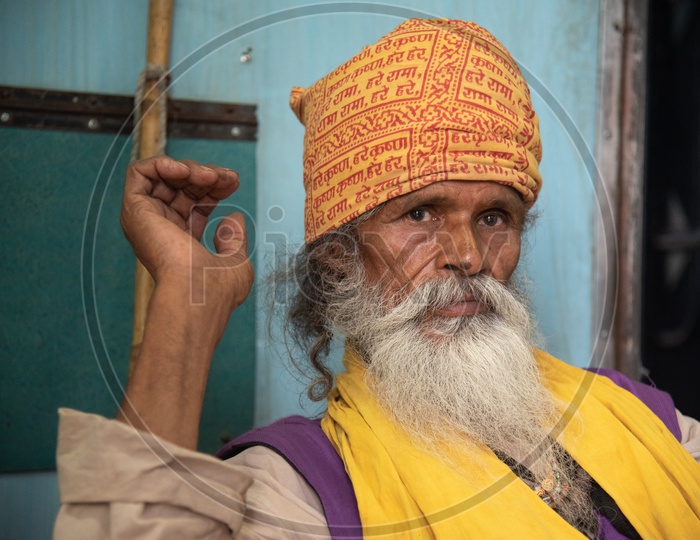 Image of Indian Sadhu Or Baba Chanting Prayers At A Holy River Bank ...