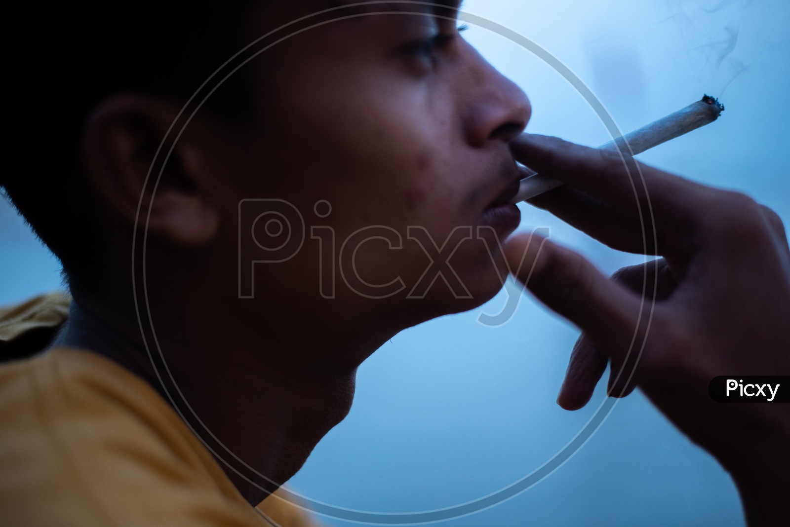 Image of A Man Smoking Joint Or Ganja Or Marijuna Or Weed Cigar Closeup ...
