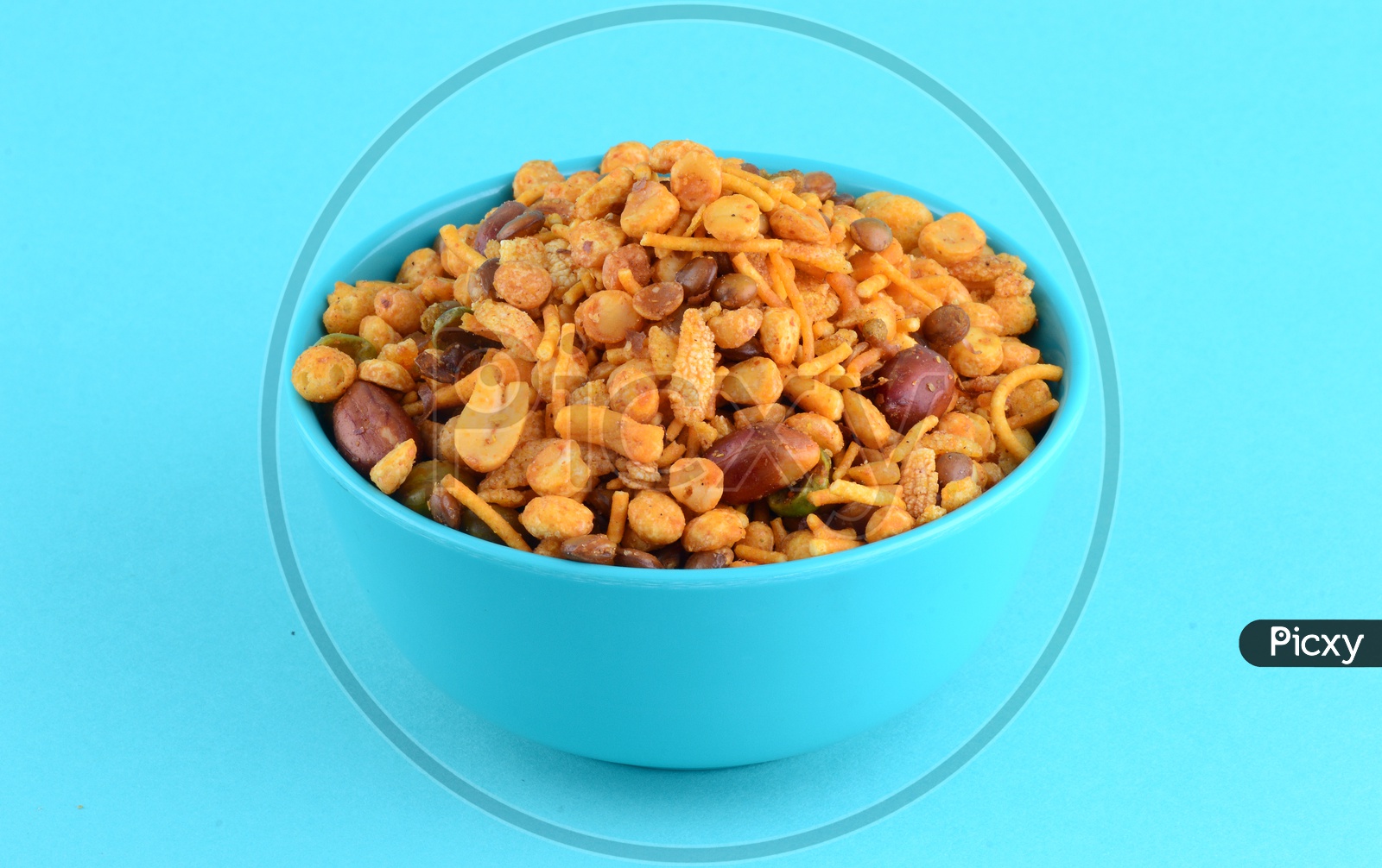 Image of Indian Snack , Salty Deep Fried Chivda Or Mixture In a Blue ...