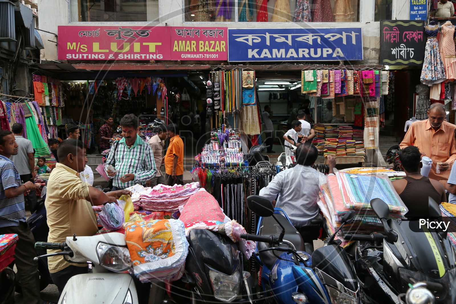 Image of A Busy Fancy Bazaar With Clothes Stores And Shoppers-BB332099 ...