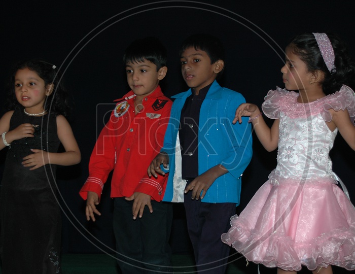 Image of Children Performing on a Stage In a Cultural Event Or In a ...