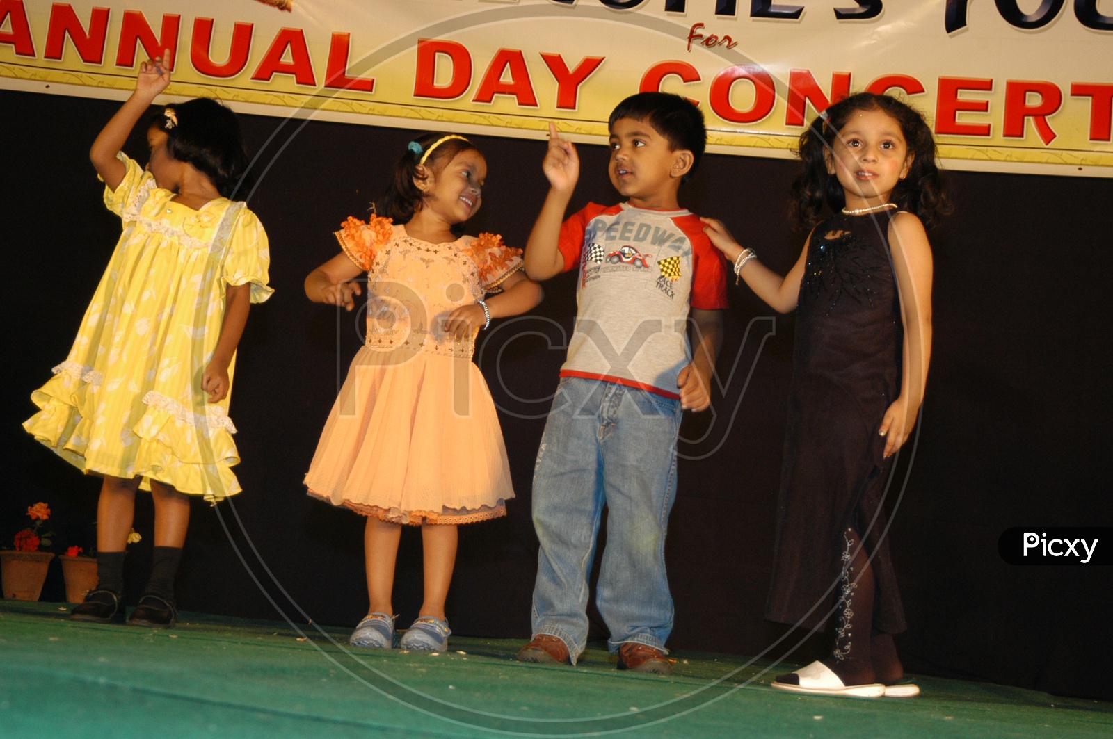 Image of Children Or School Students Performing On Stage Wearing Fancy ...