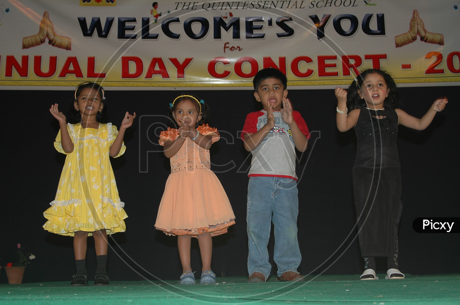 Image of Children Performing on a Stage In a Cultural Event Or In a ...