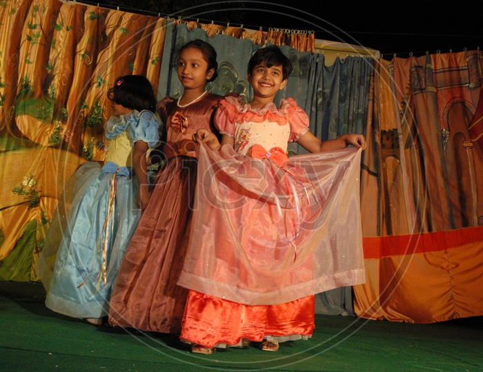 Image of Children Or School Students Performing On Stage Wearing Fancy ...