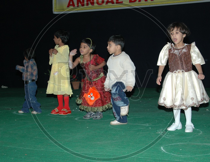 Image of Children Performing on a Stage In a Cultural Event Or In a ...
