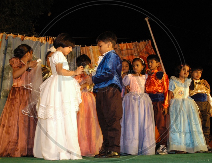 Image of Children Or School Students Performing On Stage Wearing Fancy ...