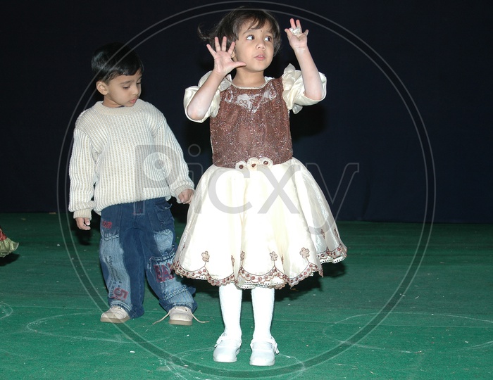 Image of Children Performing on a Stage In a Cultural Event Or In a ...