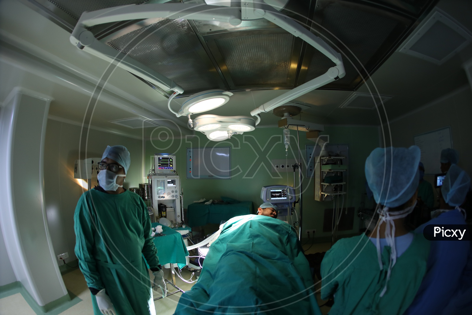 Image of Doctor Treating Patient In Operation Theater or ICU in a ...