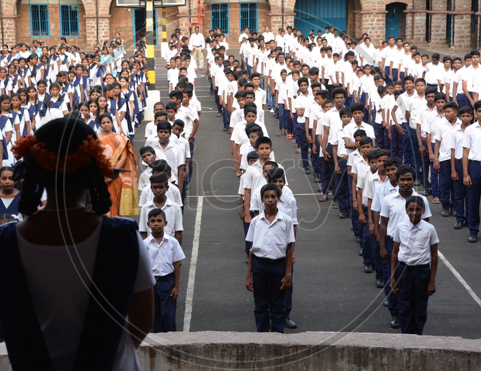 Image of School Students Standing In Rows at a School Assembly Meeting ...