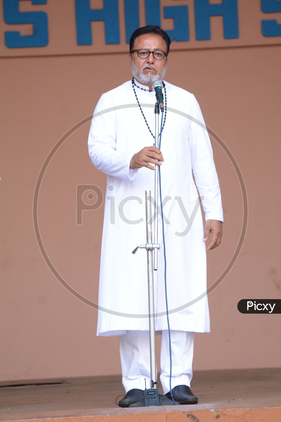 Image of A Church Father or Christian School Principal Speaking In a ...