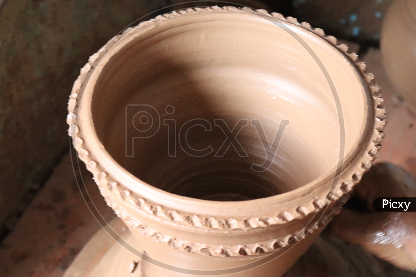 Image of Freshly sculpted Clay Pots By a Professional Potter or Pottery ...