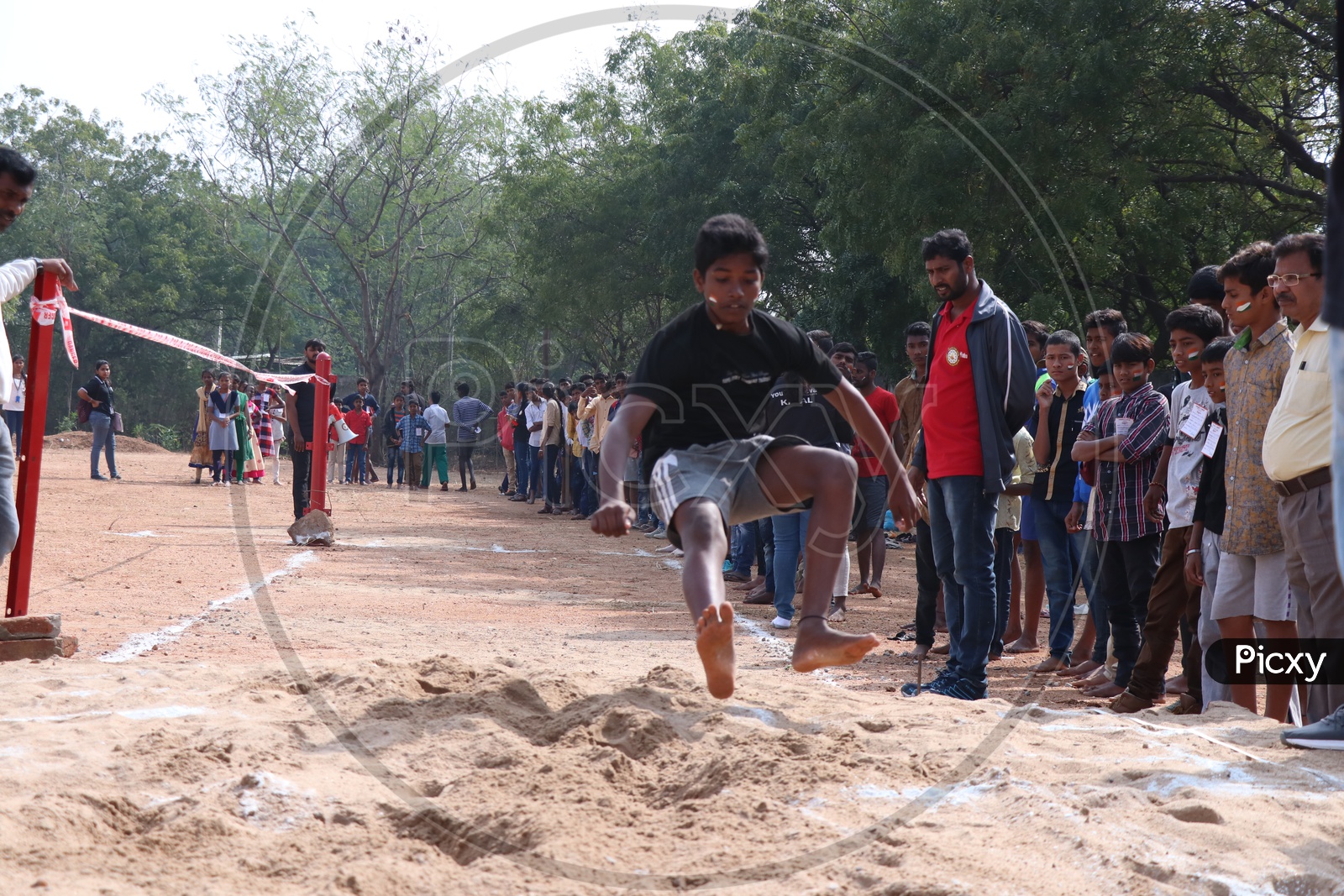 Image of Indian School Students Or Children Participating In Long Jump ...