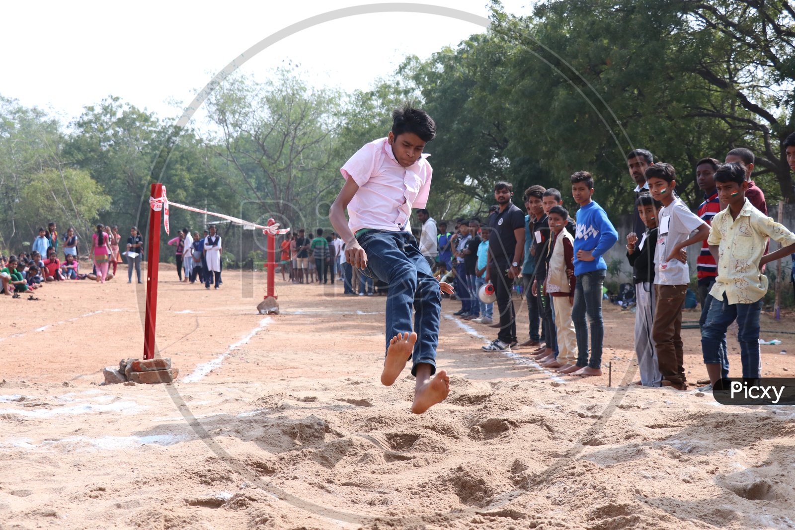 Image of Indian School Students Or Children Participating In Long Jump ...