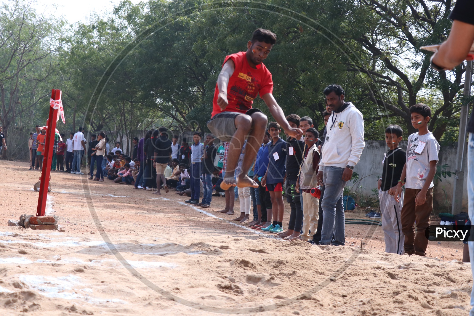 Image of Indian School Students Or Children Participating In Long Jump ...