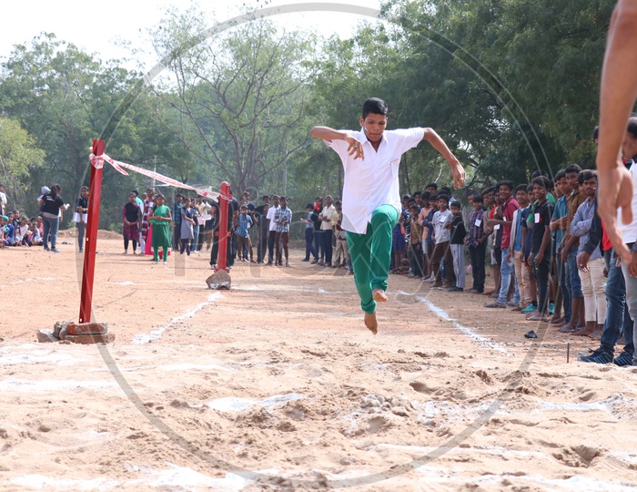 Image of Indian School Students Or Children Participating In Long Jump ...