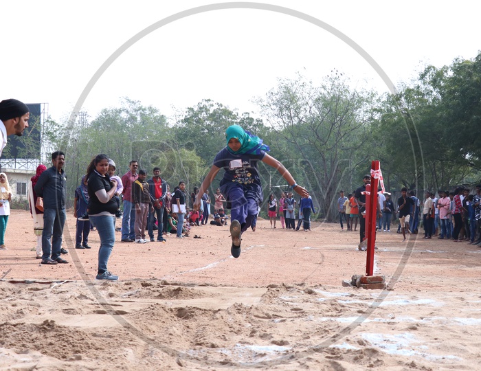 Image of Indian School Students Or Children Participating In Long Jump ...