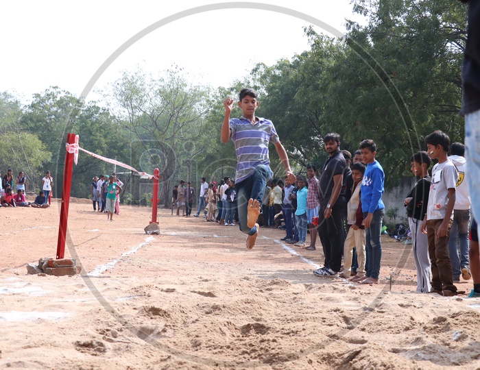 Image of Indian School Students Or Children Participating In Long Jump ...