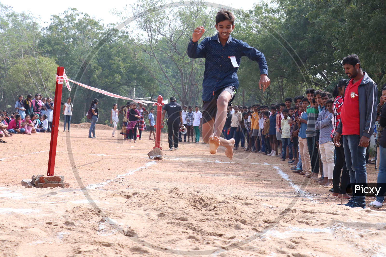 Image of Indian School Students Or Children Participating In Long Jump ...