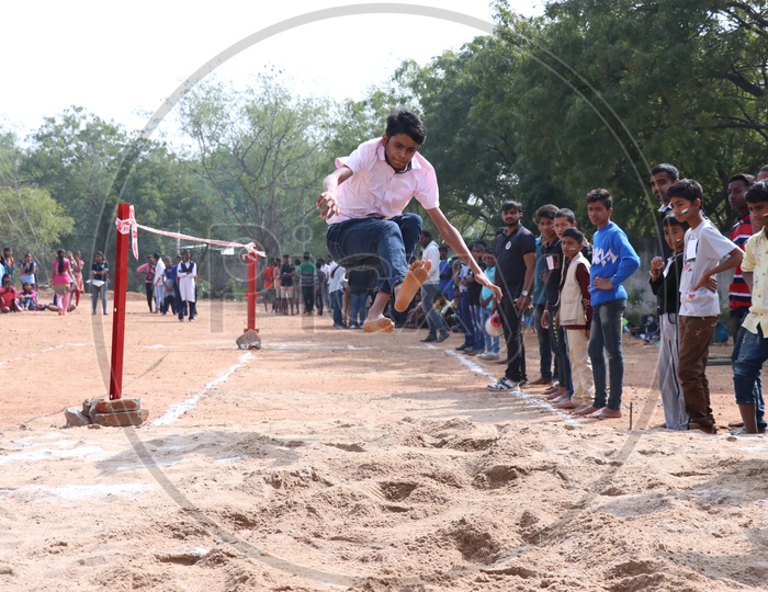 Image of Indian School Students Or Children Participating In Long Jump ...