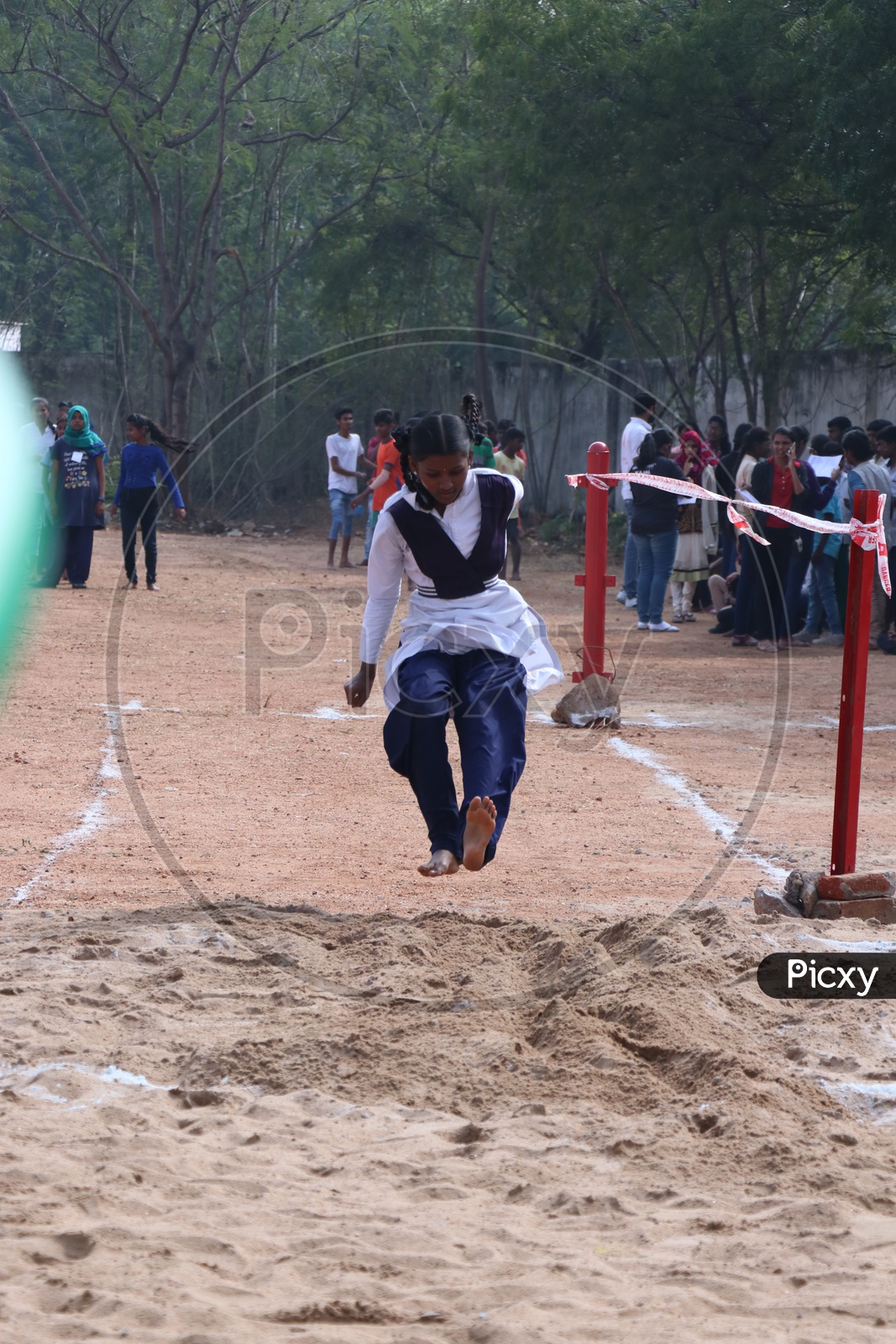 Image of Indian School Students Or Children Participating In Long Jump ...