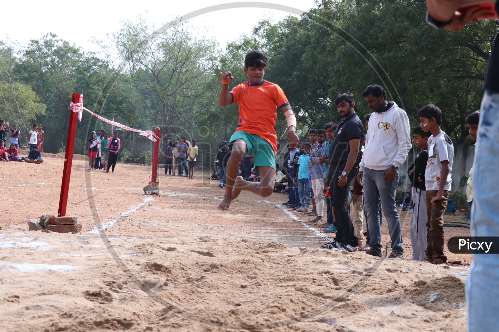 Image of Indian School Students Or Children Participating In Long Jump ...