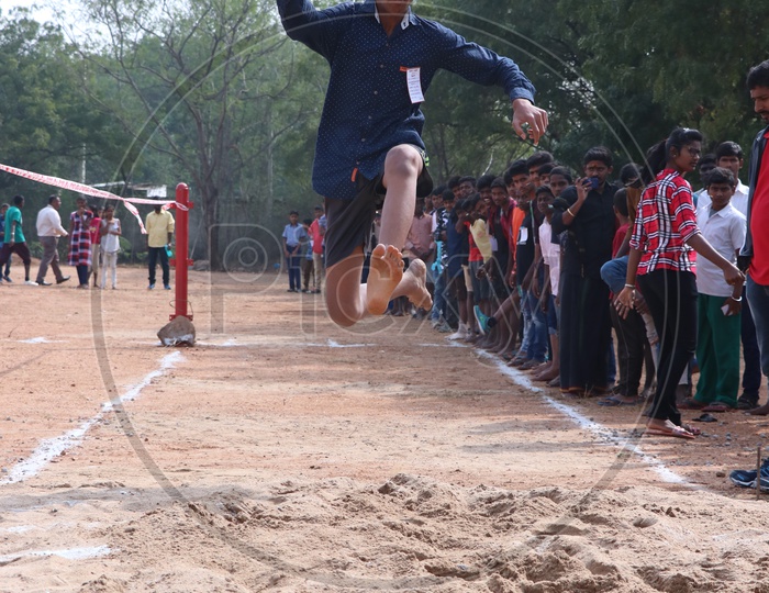 Image of Indian School Students Or Children Participating In Long Jump ...