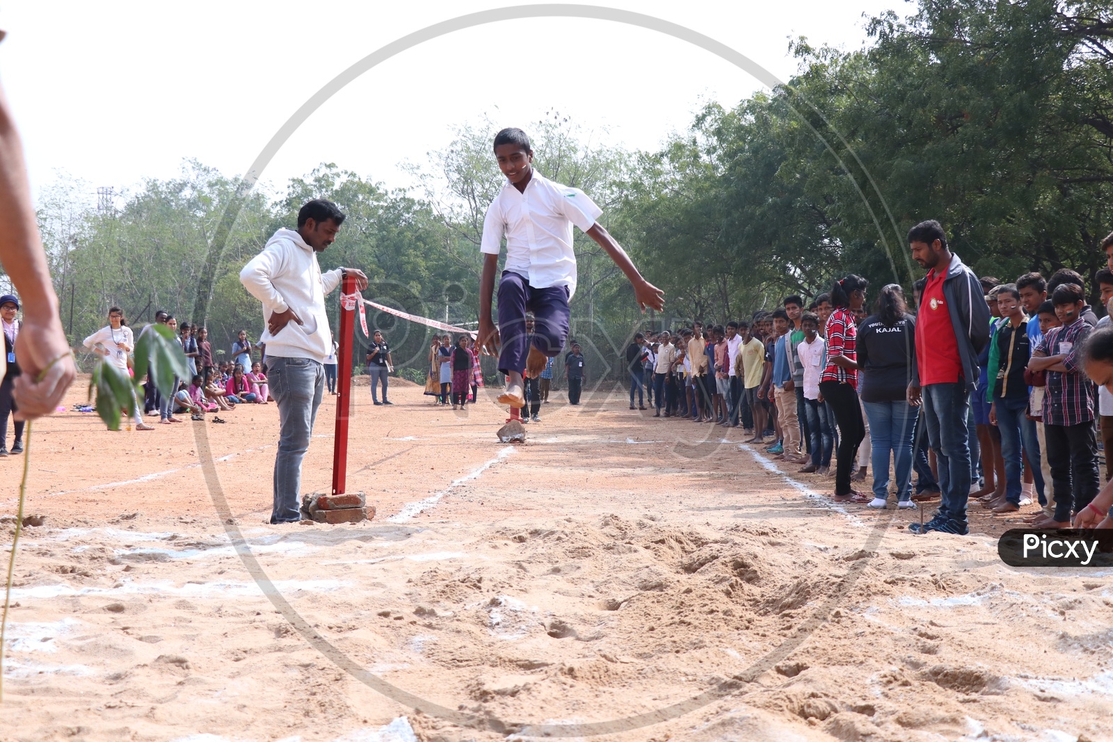Image of Indian School Students Or Children Participating In Long Jump ...