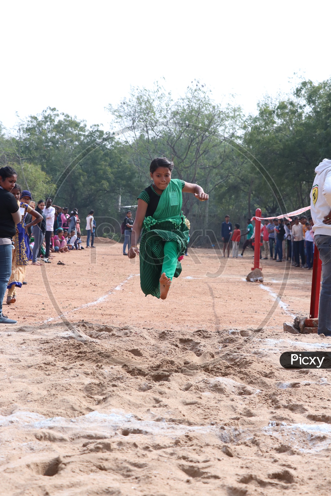 Image of Indian School Students Or Children Participating In Long Jump ...