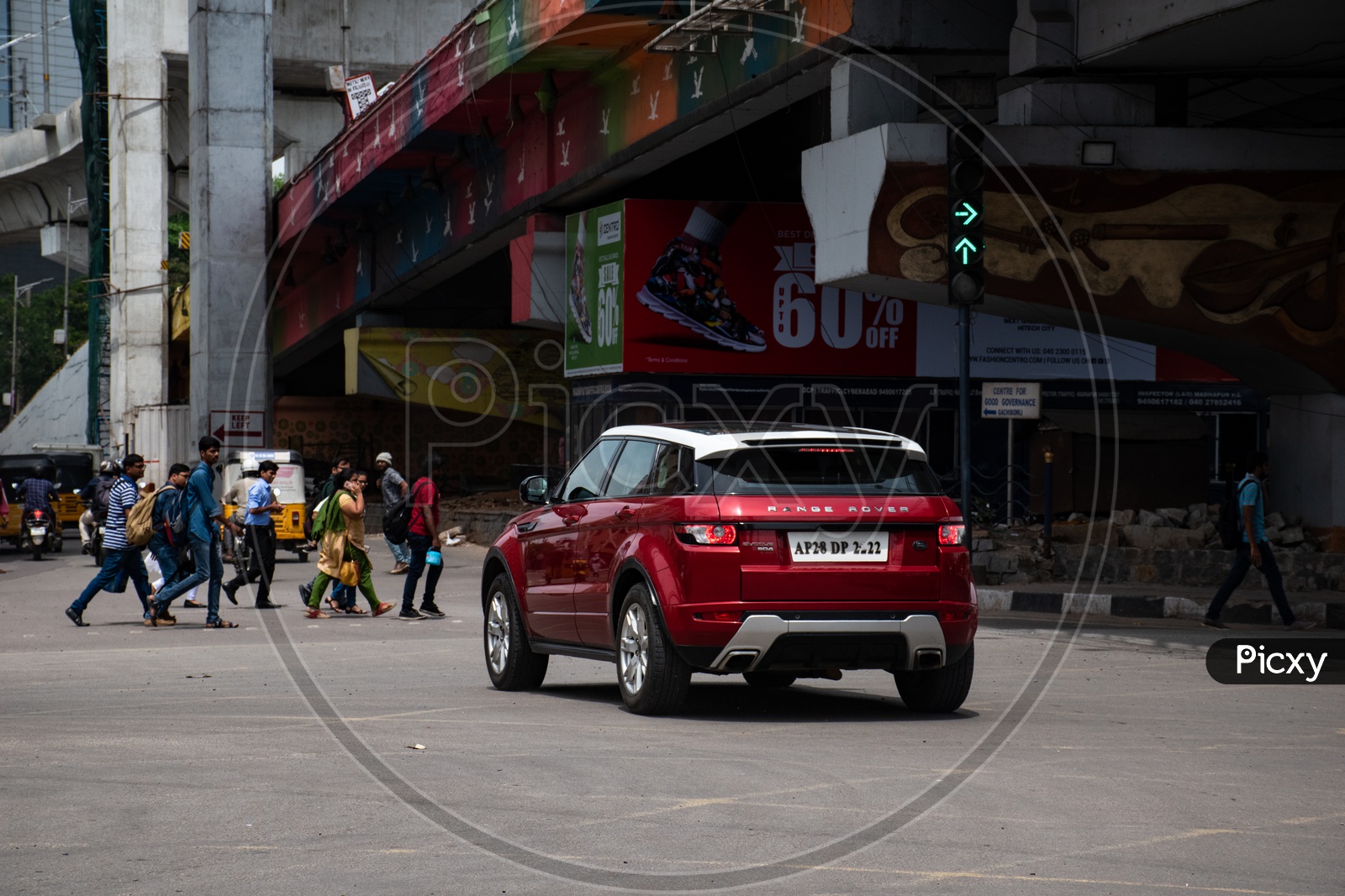 Image of Pedestrians violating and crossing the road at wrong signal ...