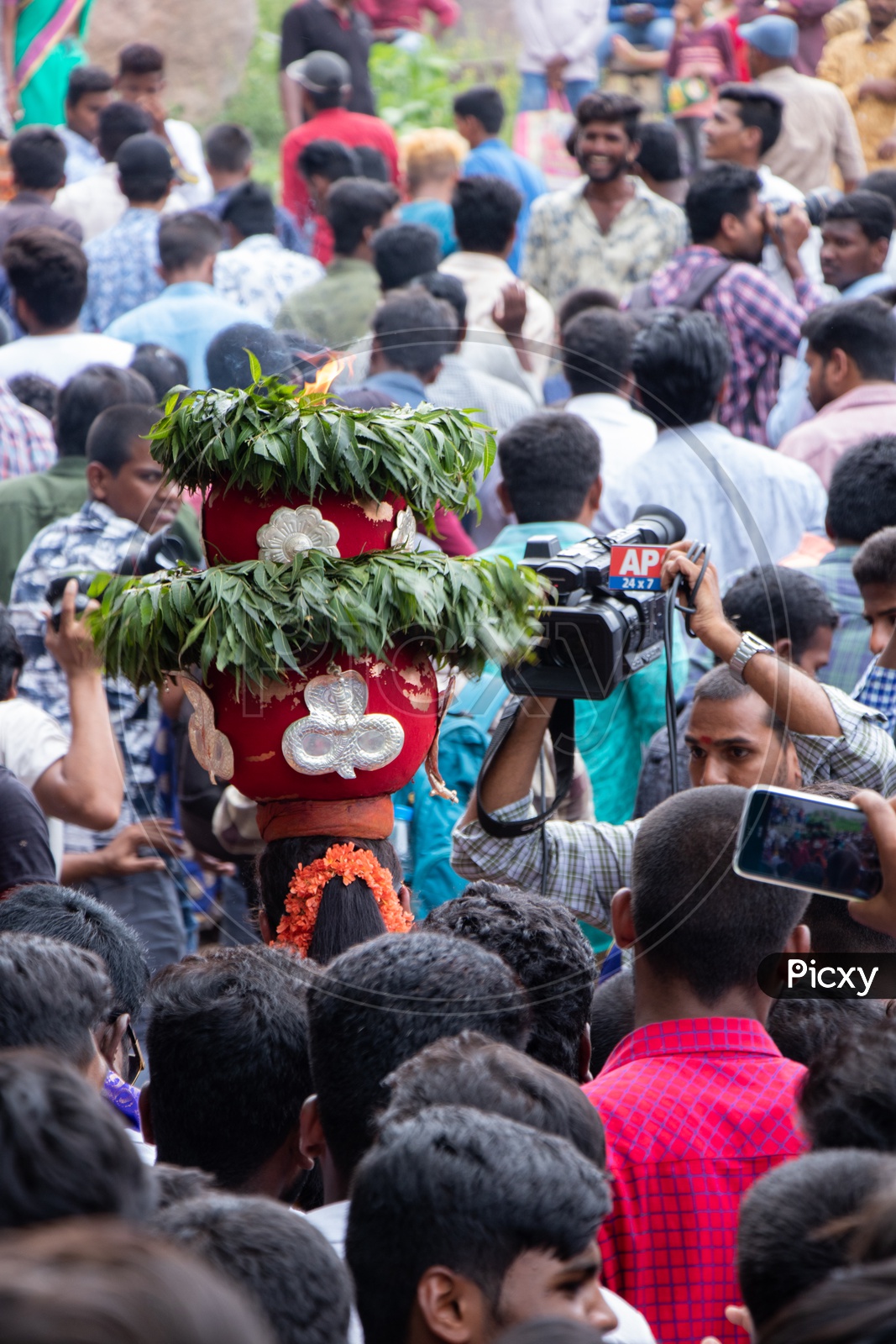 Image of A Woman Carrying Bonam or Bonalu On Her Head At Golconda ...