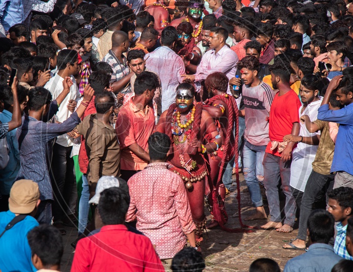Image of Pothuraju Being Beating And Dancing Along The Crowd With Red ...